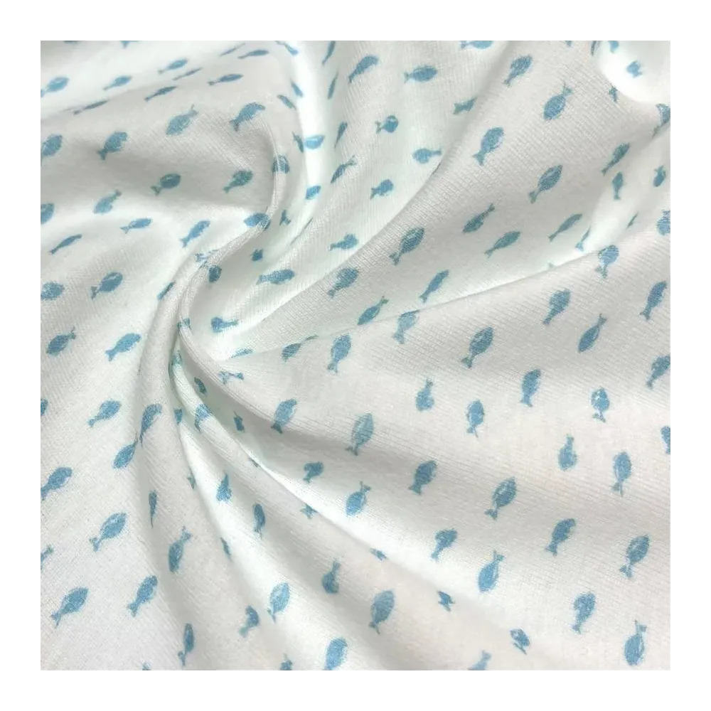 Tissu jersey coton poisson bleu ciel - Marque française